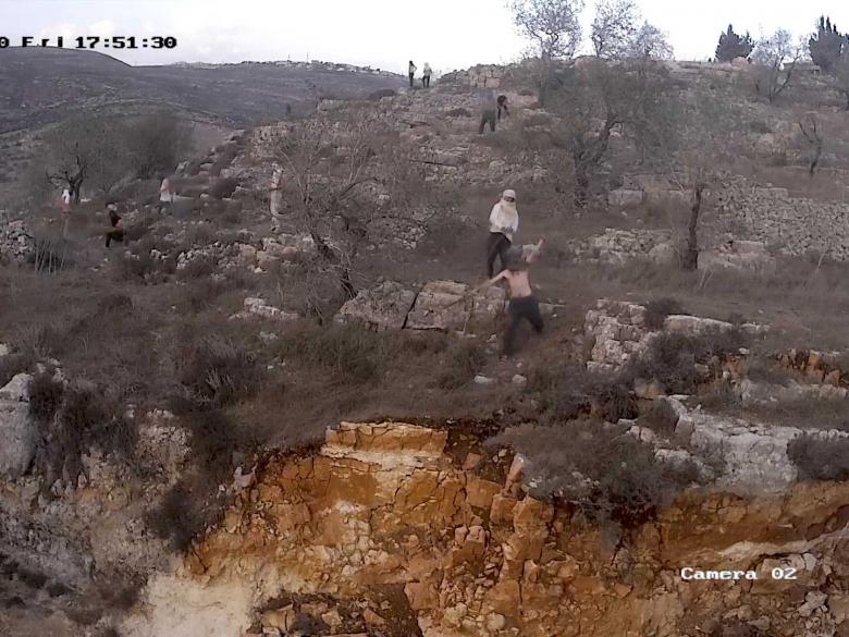 Israeli settlers stone homes in Burin, escorted by soldiers who fire ...